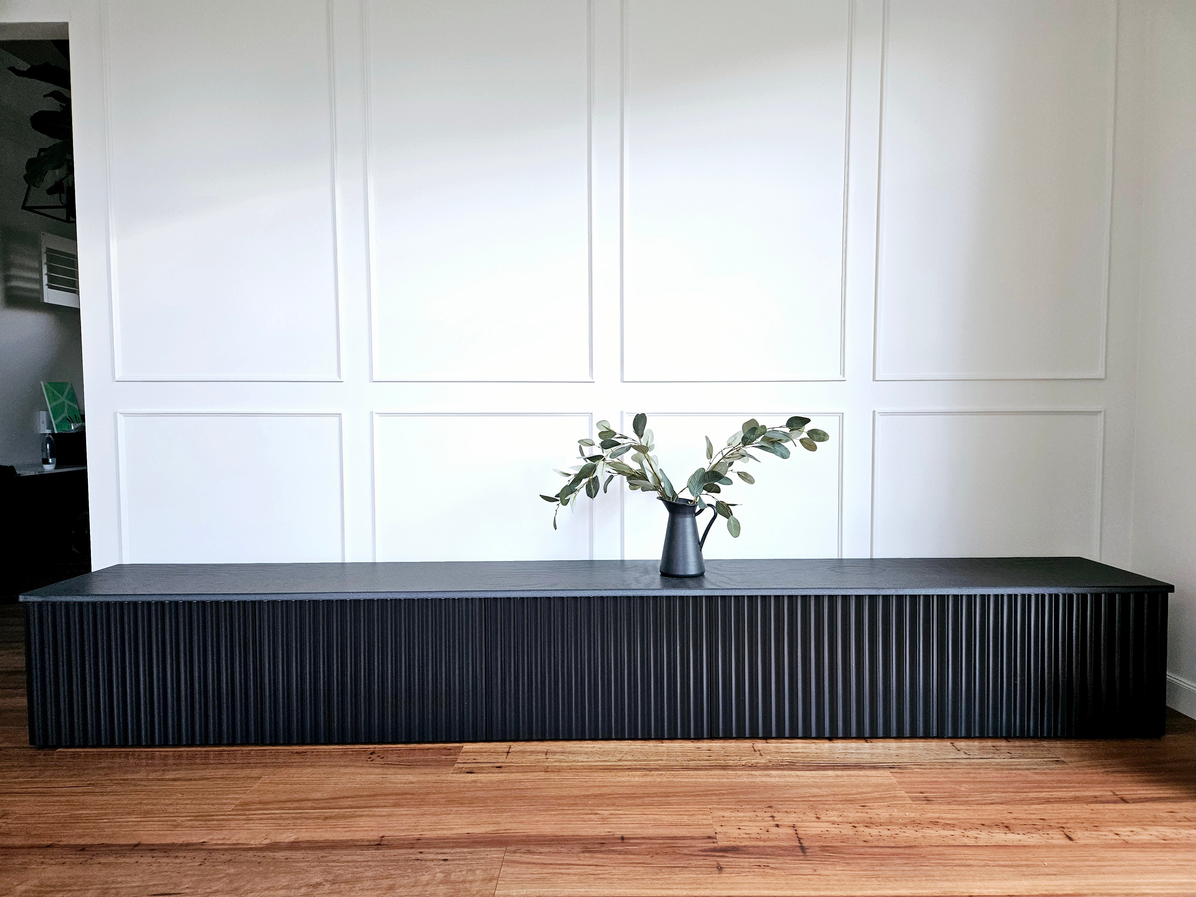 Black fluted TV unit with stone top – Catwalk Furniture